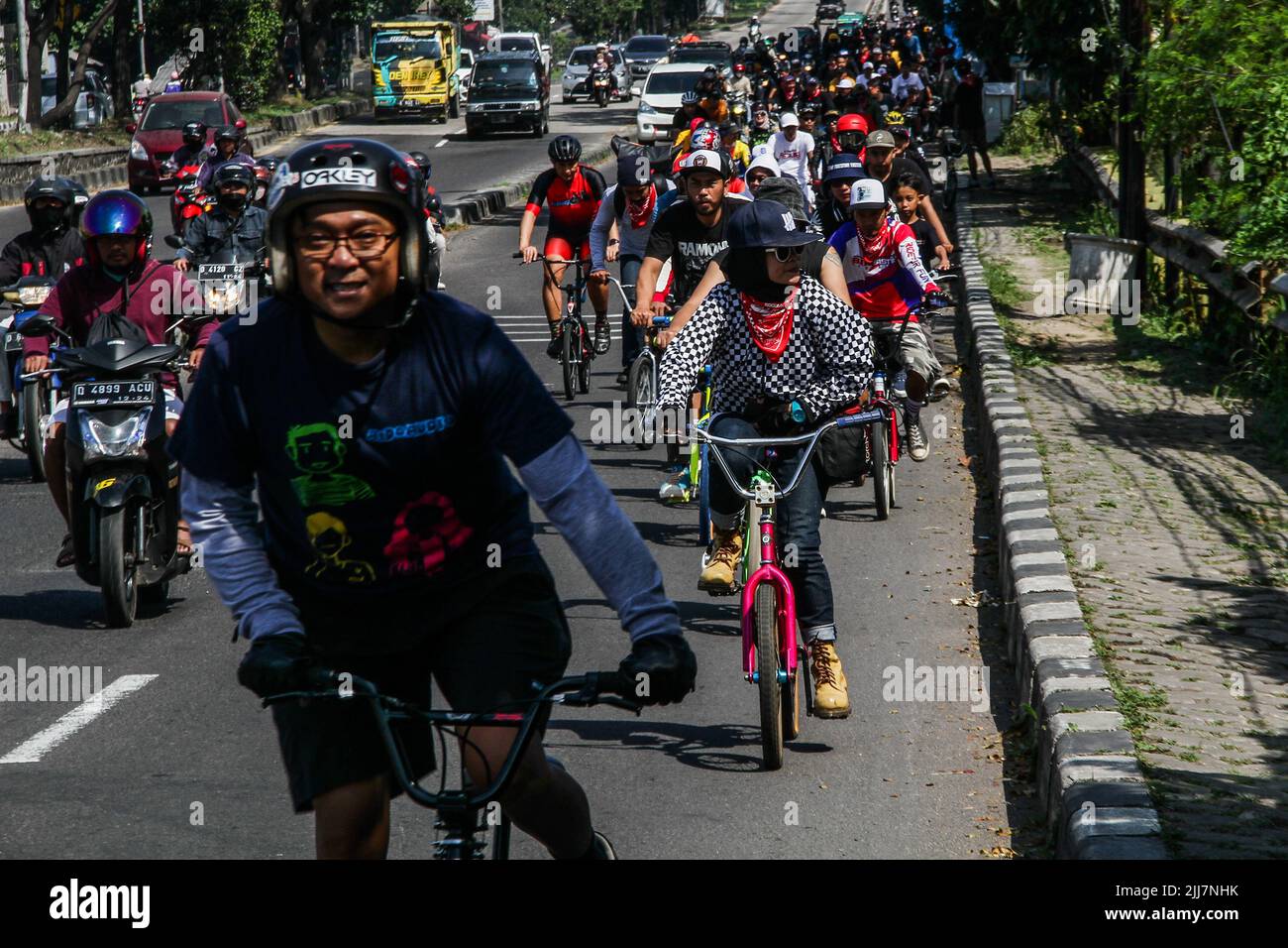 Bandung, West Java, Indonesia. 24th July, 2022. Cyclists ride in the ...