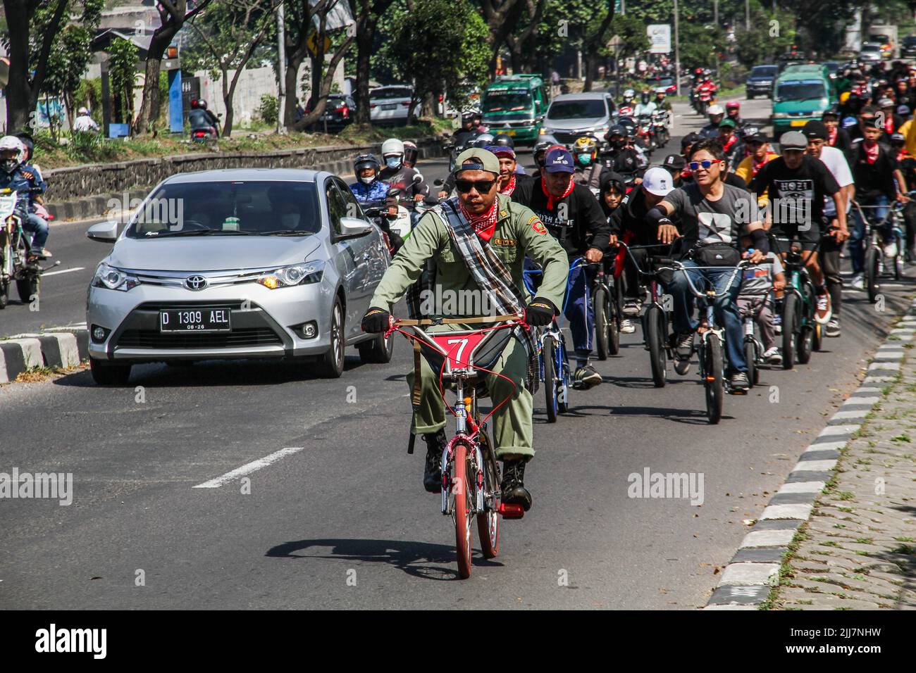 Bandung, West Java, Indonesia. 24th July, 2022. Cyclists ride in the ...