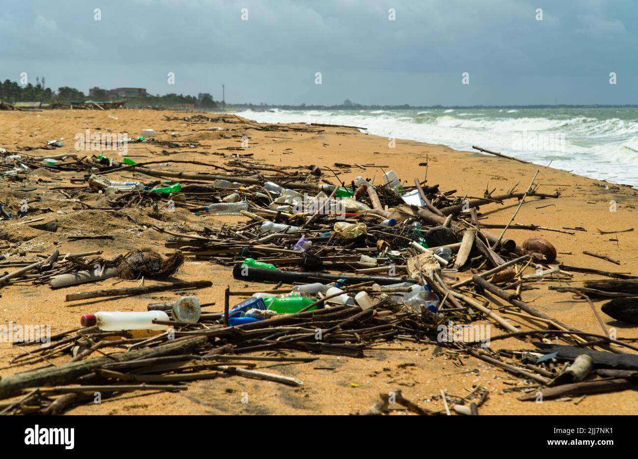 Discarded plastic debris trash pollution after sea swell storm ...