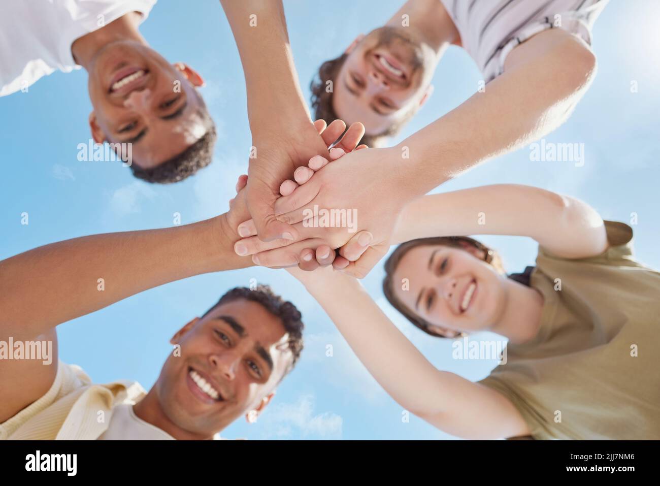 Supportive friends are the best friends. Low angle shot of a group of ...