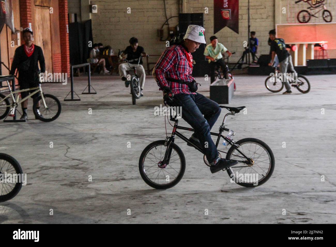 Bandung, West Java, Indonesia. 24th July, 2022. Cyclists performs a ...