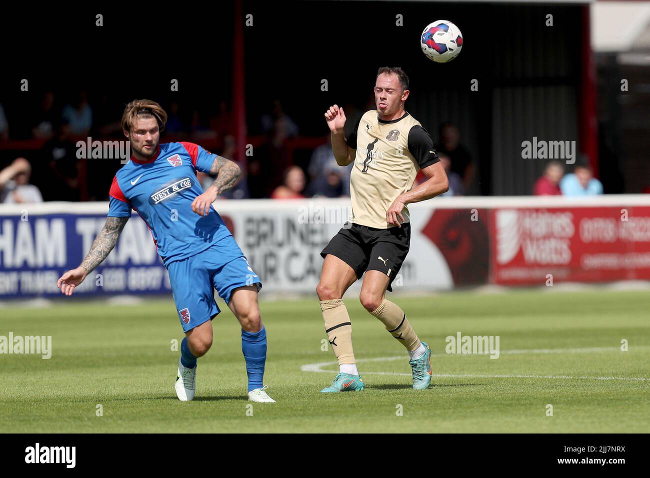 Theo Archibald of Orient and Elliot Johnson of Dagenham during Dagenham ...