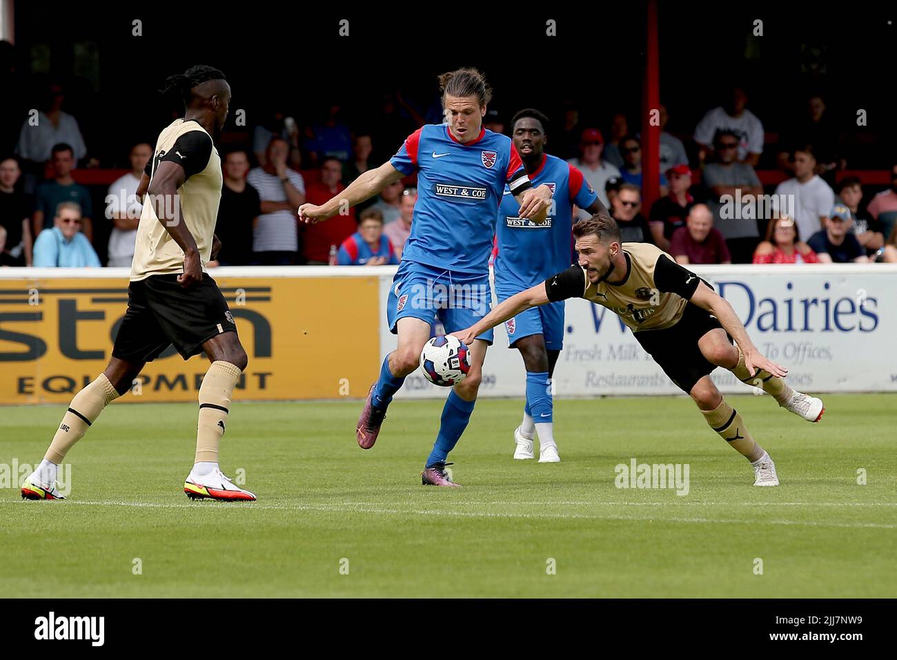 Matt Robinson of Dagenham and Craig Clay of Orient during Dagenham ...