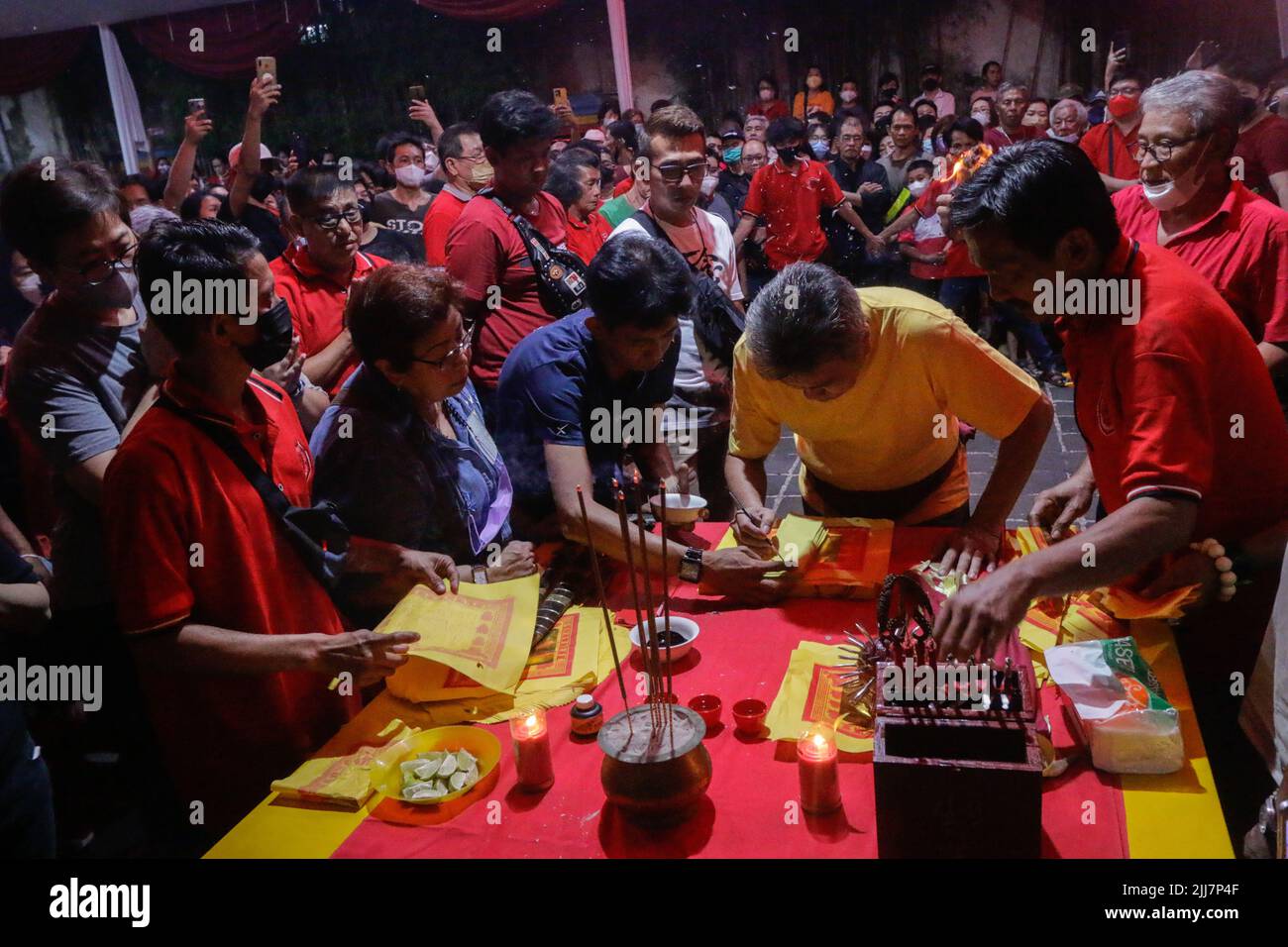 A Indonesian Chinese devotee take part in a ritual at Dhanagun temple ...