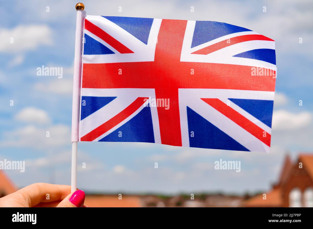 The national union jack flag of Great britain red white and blue colors ...