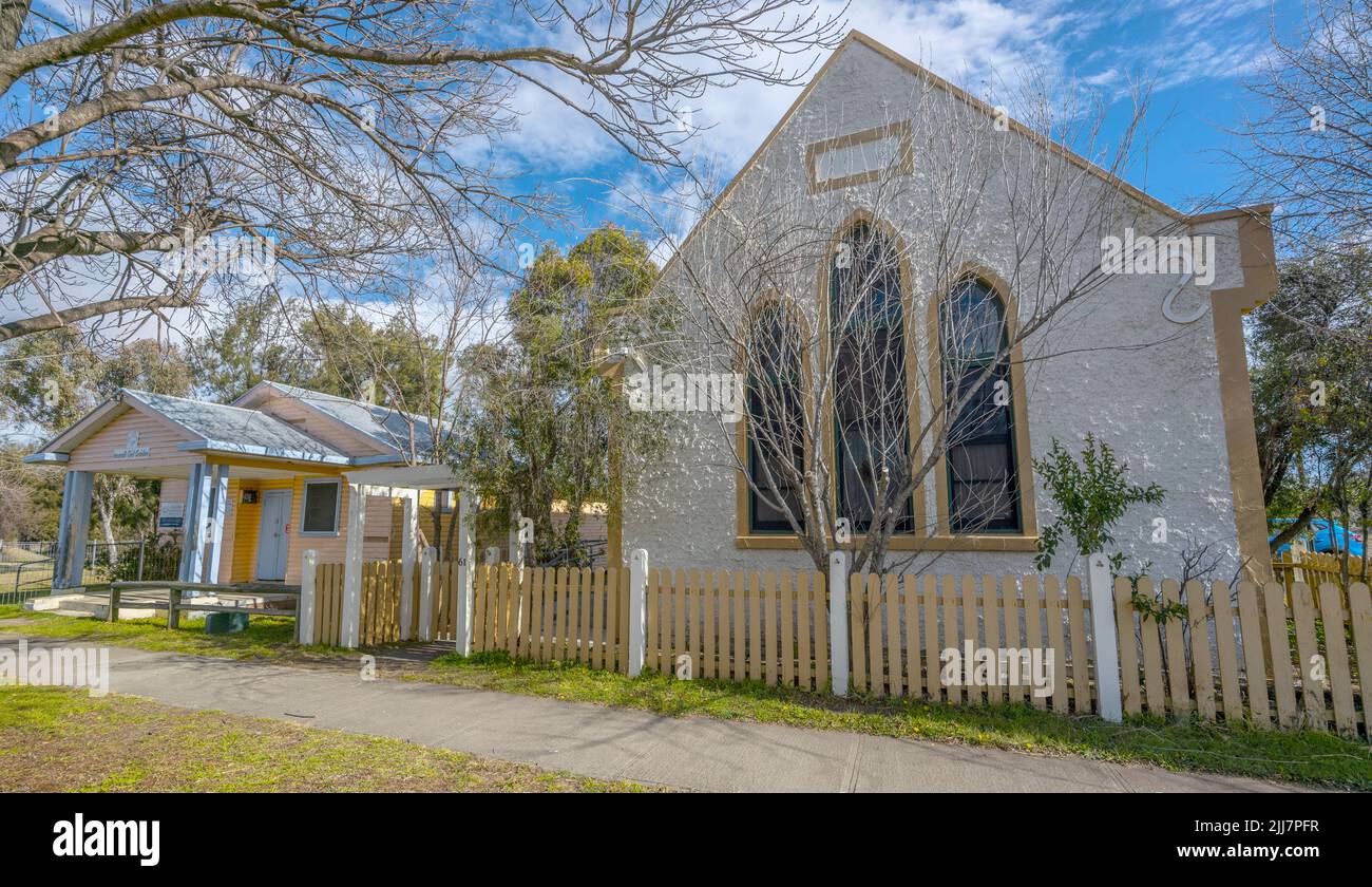 The Inverell Girl Guide hall and old church next door, signed as ...