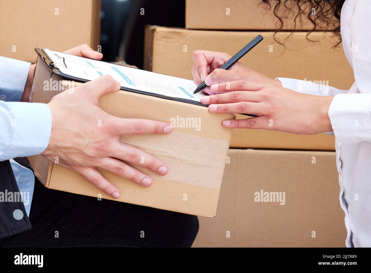 You have to sign before we can hand over. a customer signing for her ...