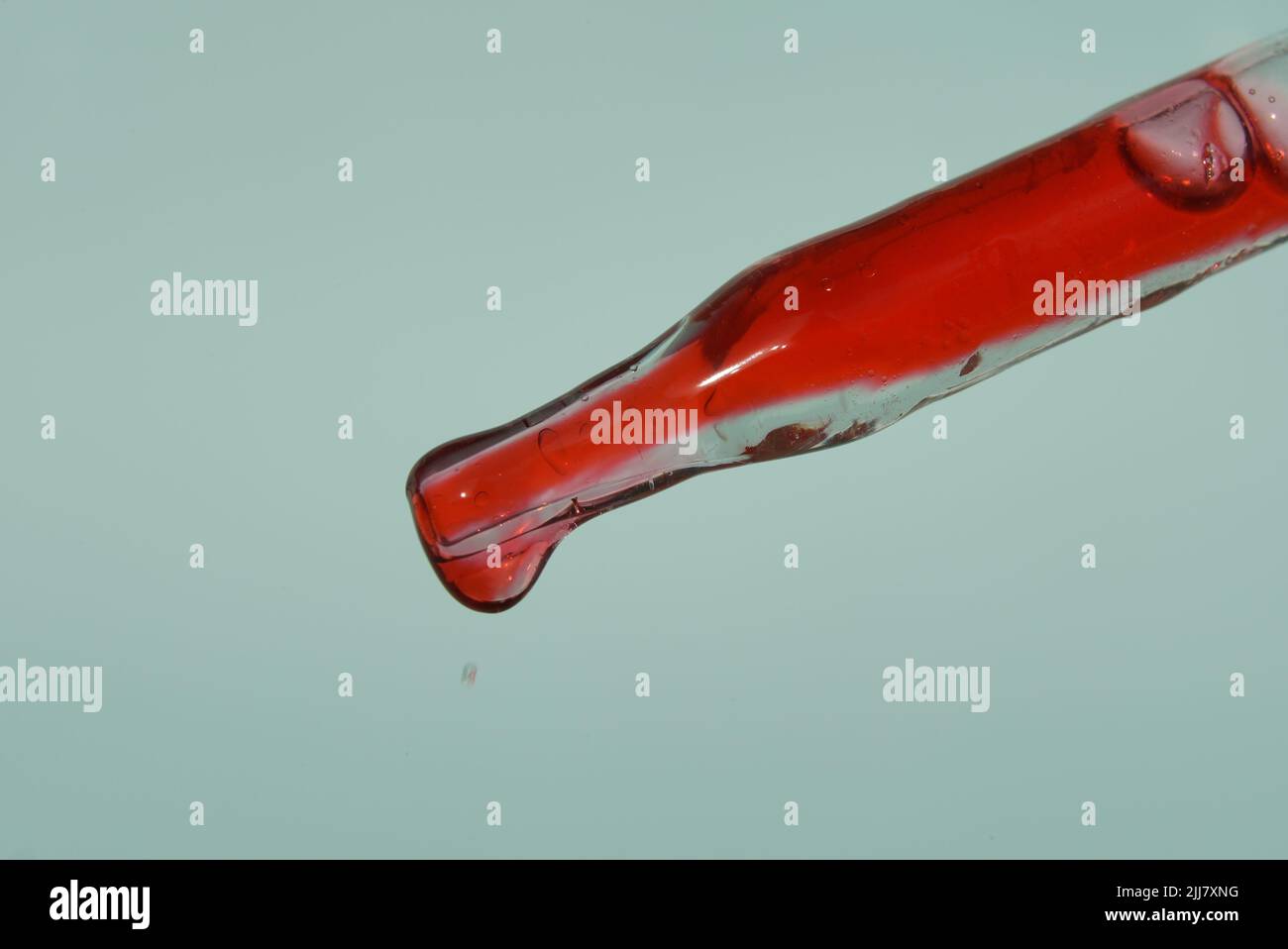 Close-up of a pipette with blood. The concept of developing a ...