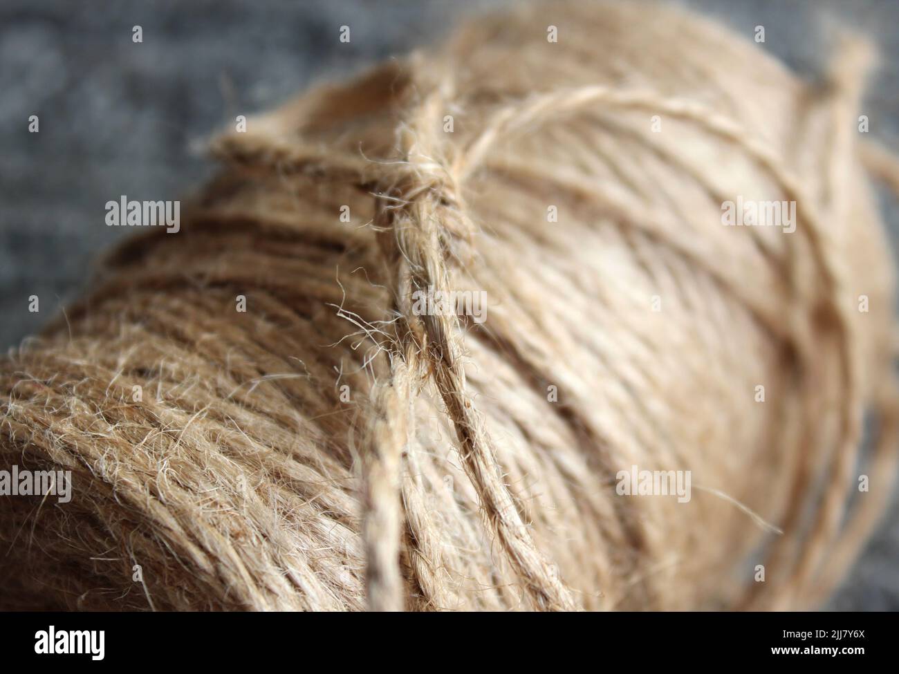 Skein of jute twine. Natural jute twine, macro shot. Rough jute thread ...