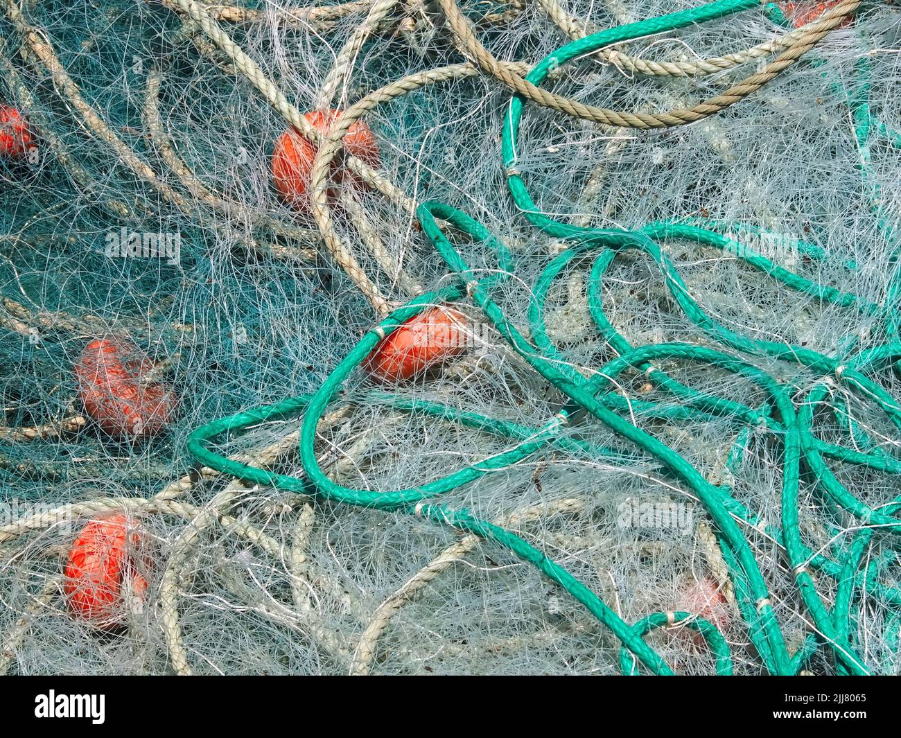 Brown fisher net to catch fish Stock Photo - Alamy