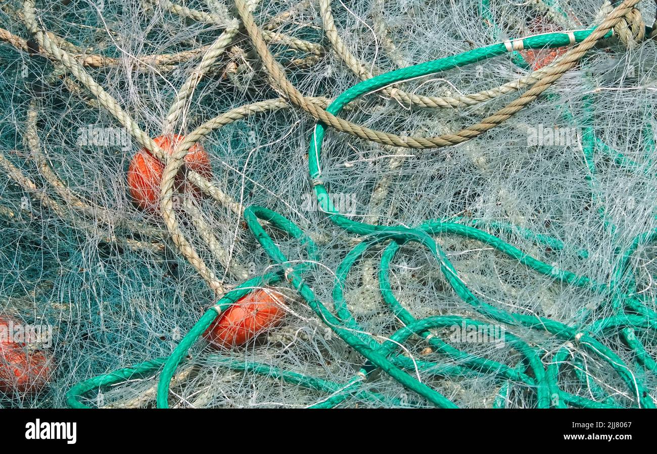Brown fisher net to catch fish Stock Photo - Alamy