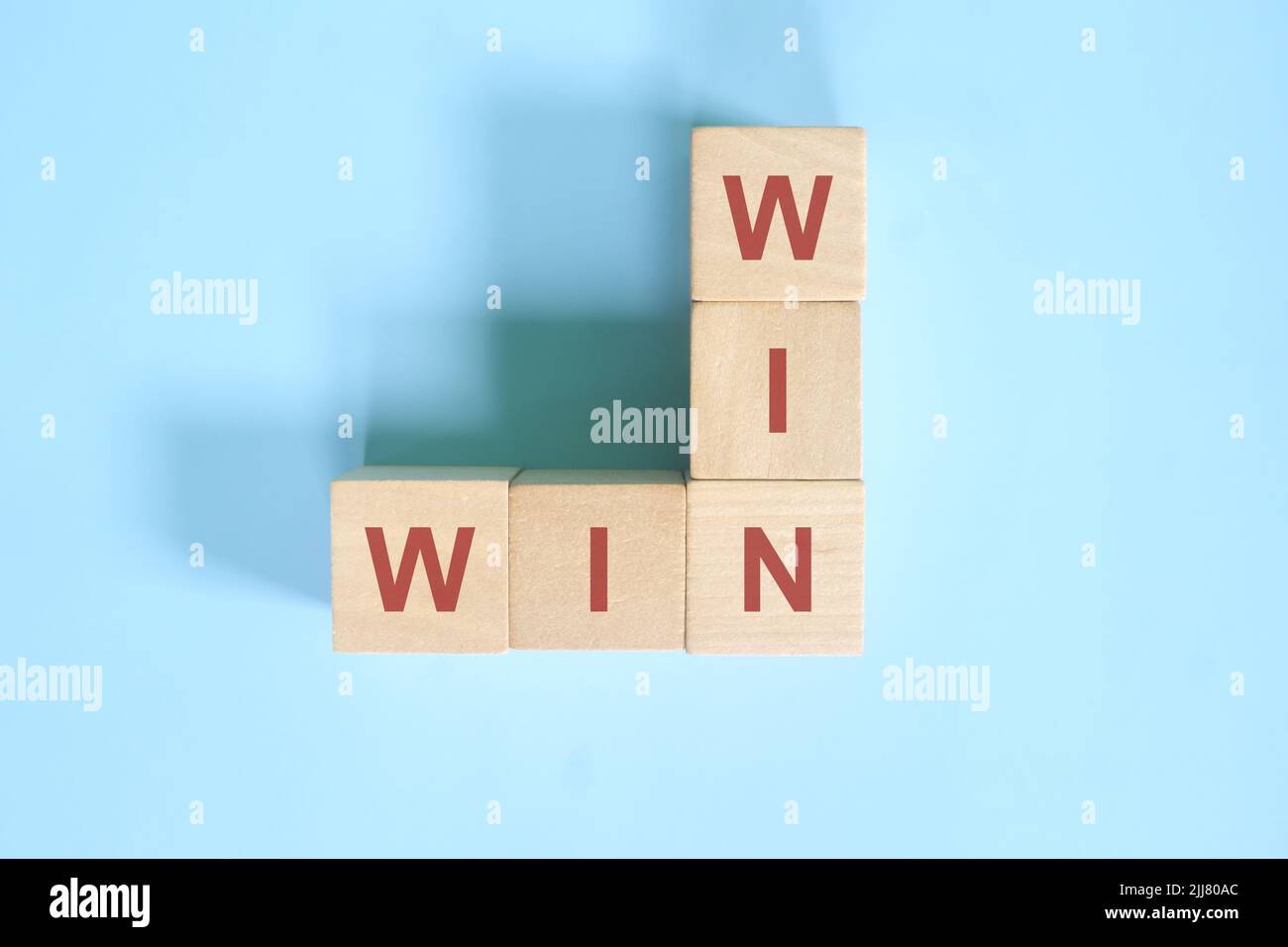 Win-win or win win in business concept. Wooden blocks crossword puzzle ...