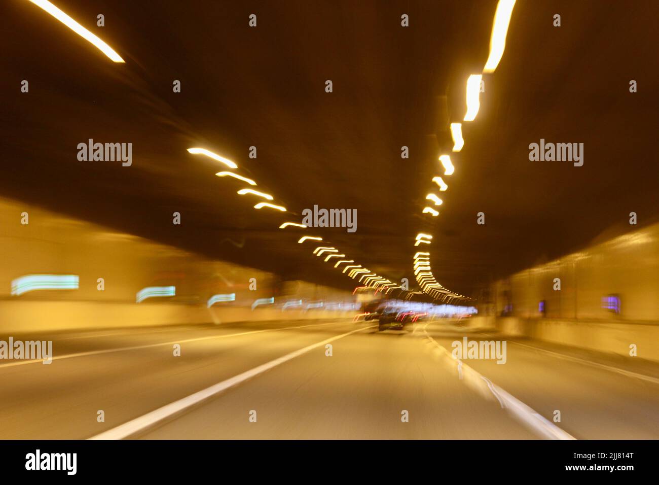 hatfield tunnel on A1 M motorway with blurry cars and lights england UK ...