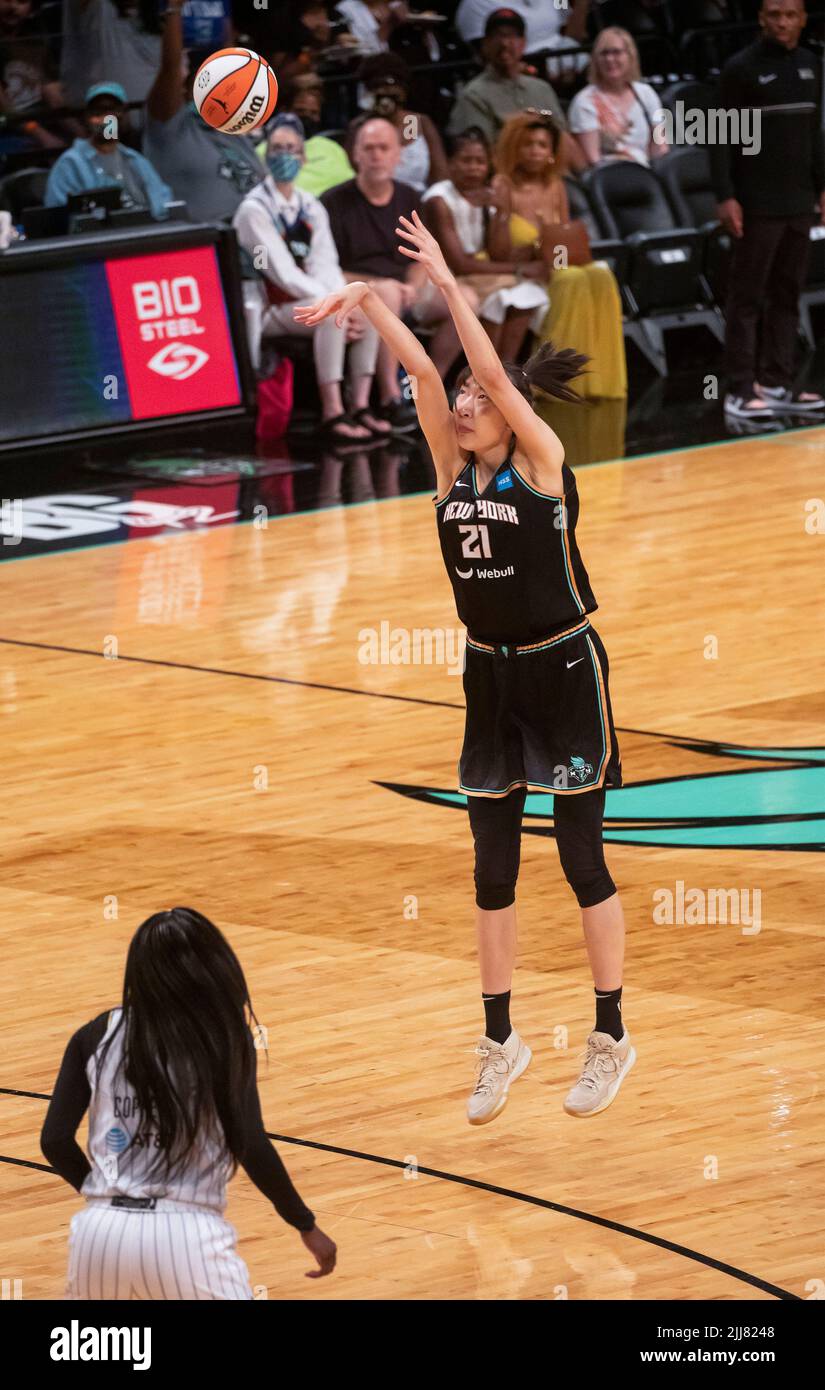 New York, USA. 23rd July, 2022. Han Xu (R) of New York Liberty shoots ...