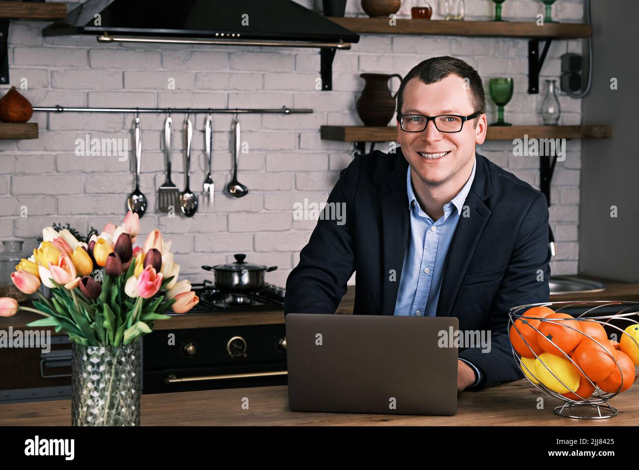 Remote Work With Laptop Portrait Of Young Smiling Businessman Wearing