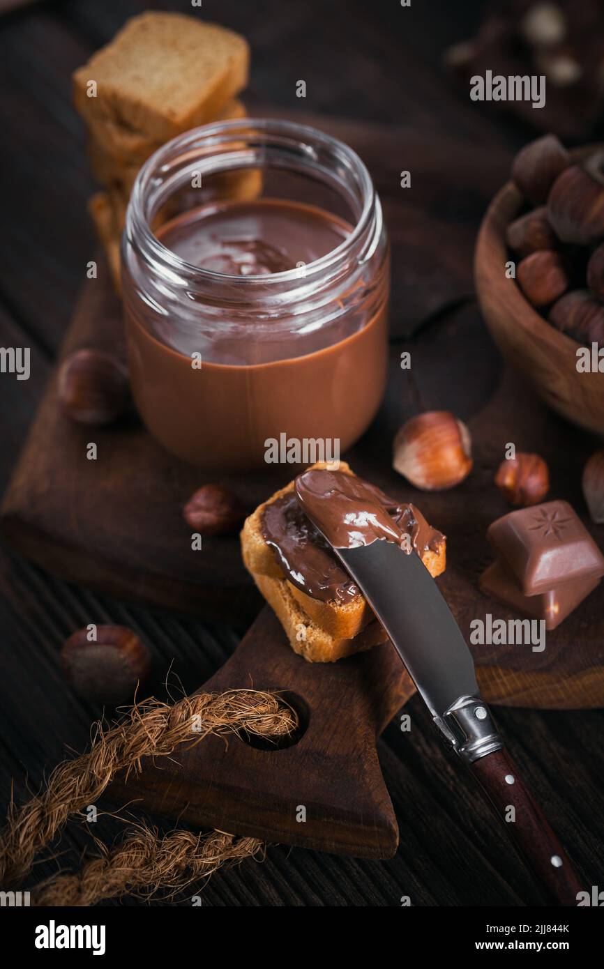 Little Toasts with sweet chocolate spread for breakfast Stock Photo - Alamy