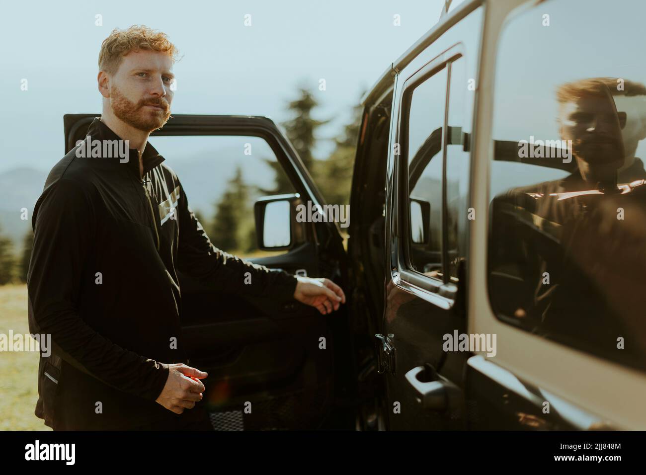 Young guy getting in car hi-res stock photography and images - Alamy