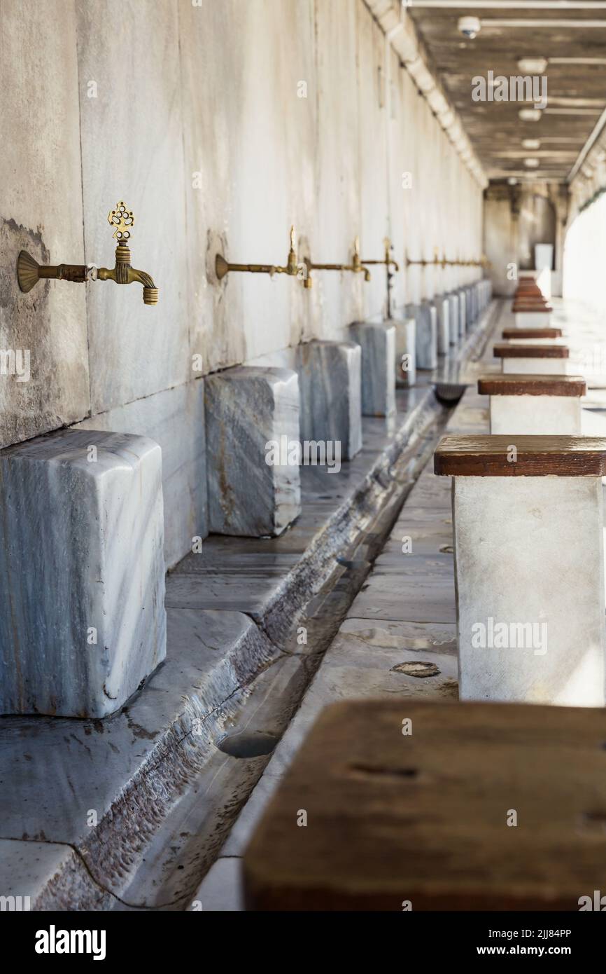 Washing area before entering in Mosque. Ablution room Stock Photo - Alamy