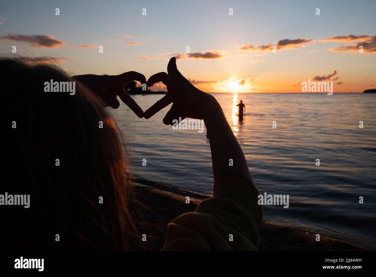 Hand holding heart sky hi-res stock photography and images - Alamy