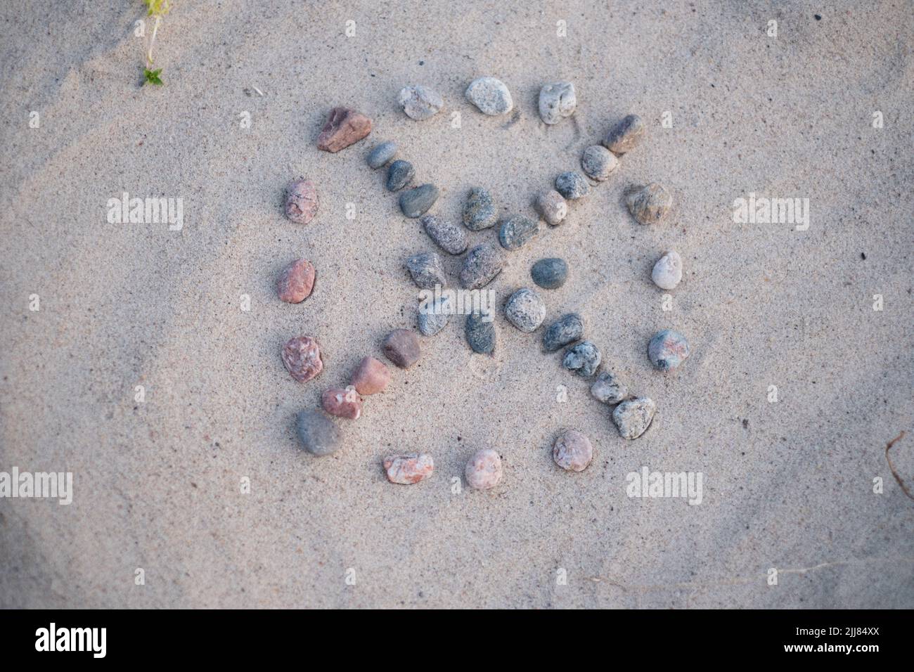 Medicine wheel. Native American circle stone pattern with spokes to ...