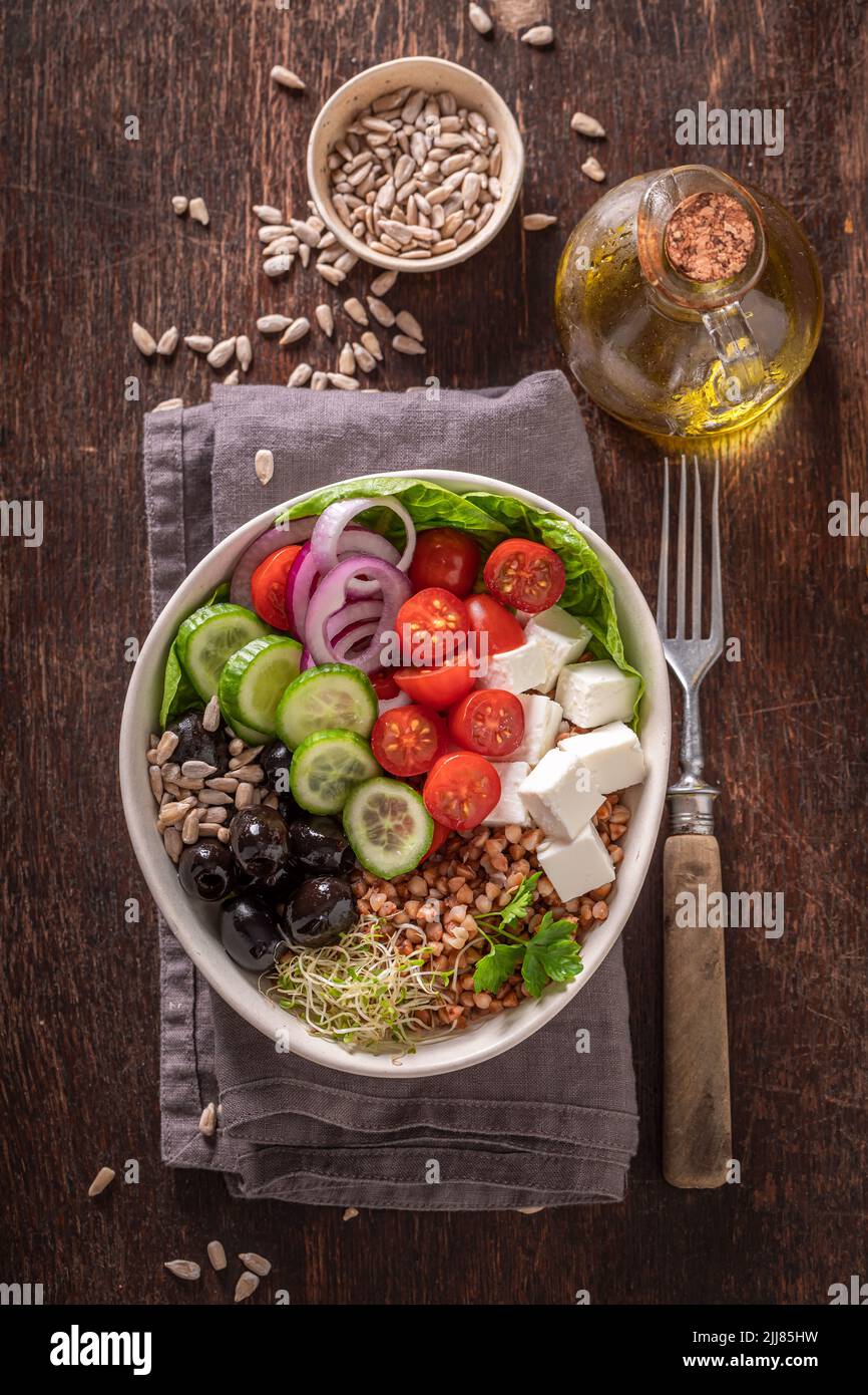 Colorful Greek salad in the fit version with buckwheat groats ...