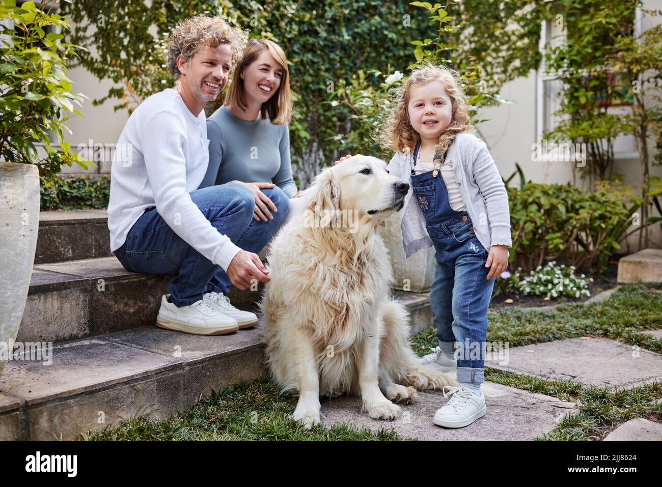 The head of our family is our dog. Portrait of a beautiful family ...