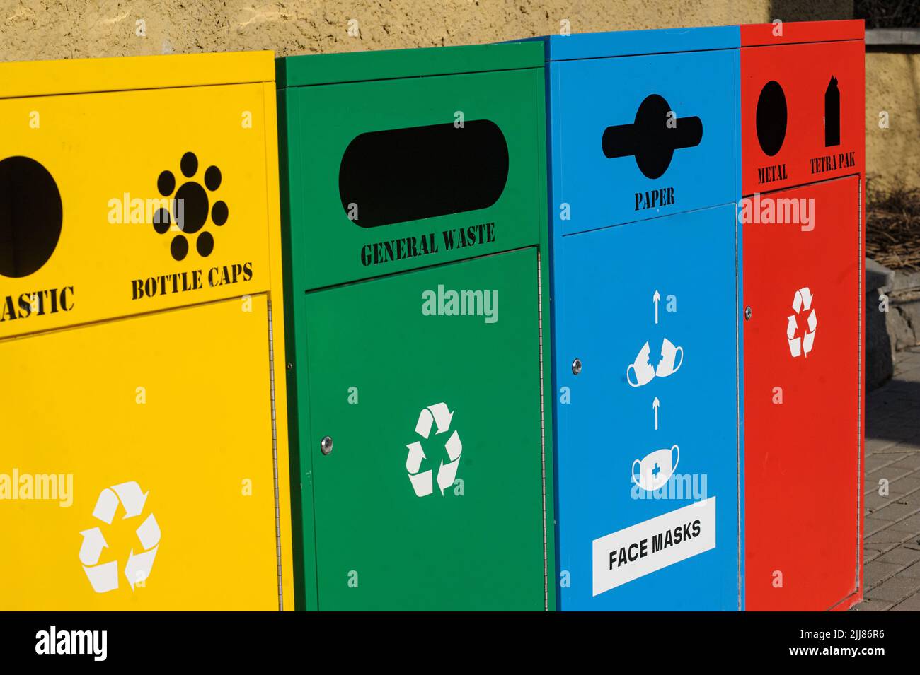 Containers for recycle paper, plastic, masks in a different colours ...