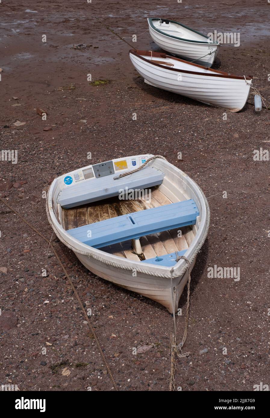 A vertical shot of boats parked on a sandy beach Stock Photo - Alamy