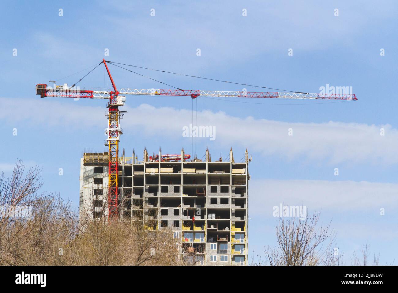 Lifting crane. Construction of high structures. Rise to height ...