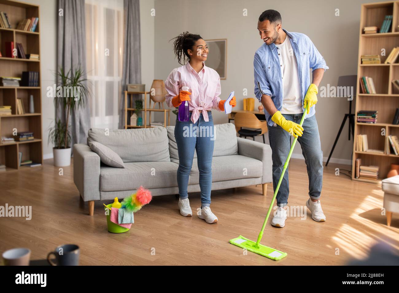 Husband doing housework hi-res stock photography and images - Alamy