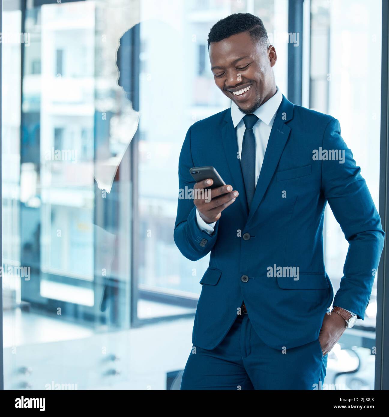 The stock market is sizzling today. a young businessman using a ...