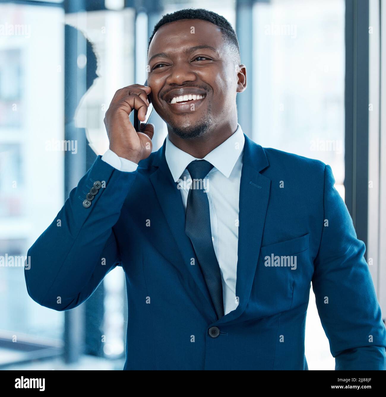 One call could open up many opportunities. a young businessman using a ...