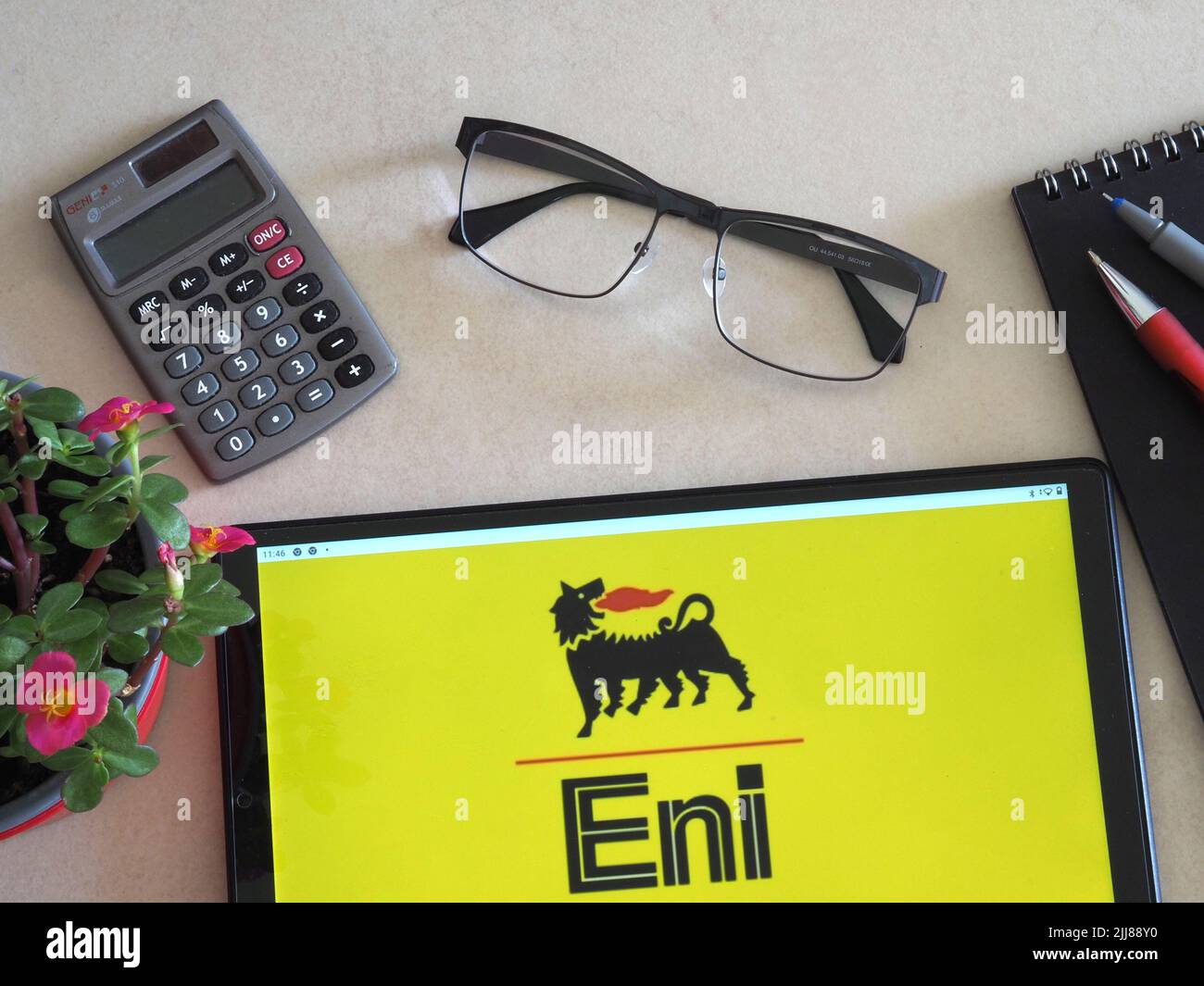 In this photo illustration, Eni S.p.A. logo seen displayed on a tablet ...