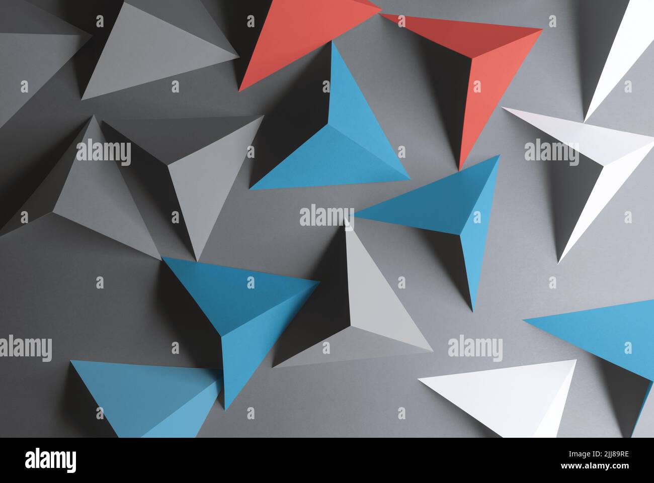 Triangular elements of paper, abstract Stock Photo - Alamy
