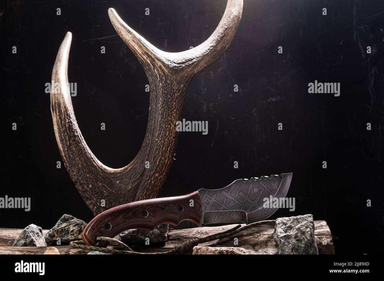 Large hunting knife and antler. Bushcraft knife and deer horn Stock ...
