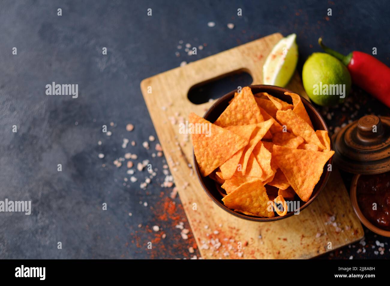 junk fast food eating crispy nacho tortilla chips Stock Photo - Alamy