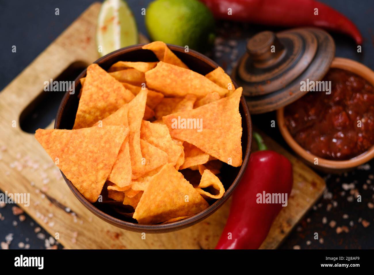 tortilla nacho chips food background crisp slices Stock Photo - Alamy