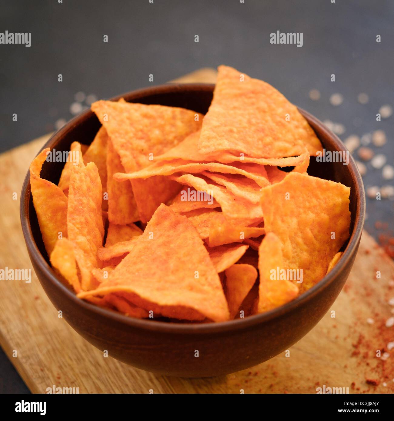 junk fast food eating crispy nacho tortilla chips Stock Photo - Alamy