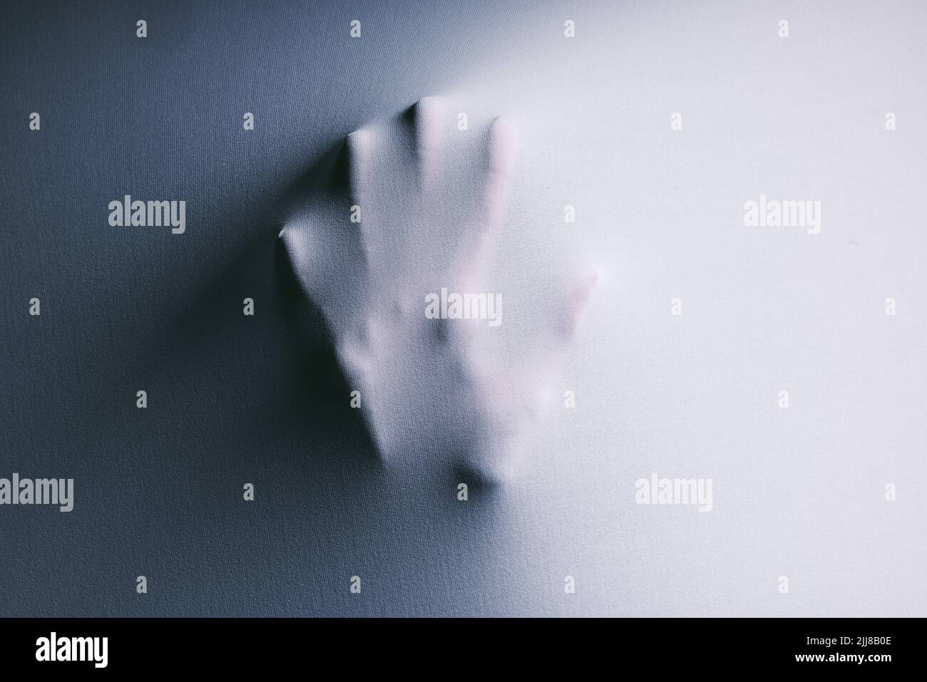 I cant escape this hell. hands confined under a sheet trying to press ...