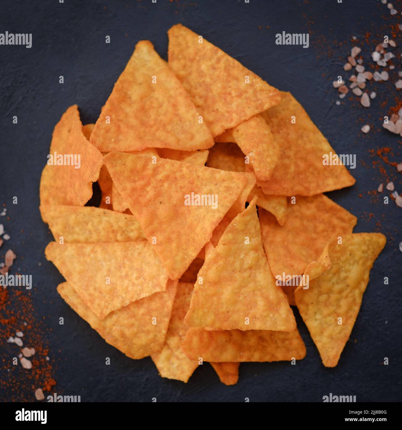 tortilla nacho chips food background crisp slices Stock Photo - Alamy