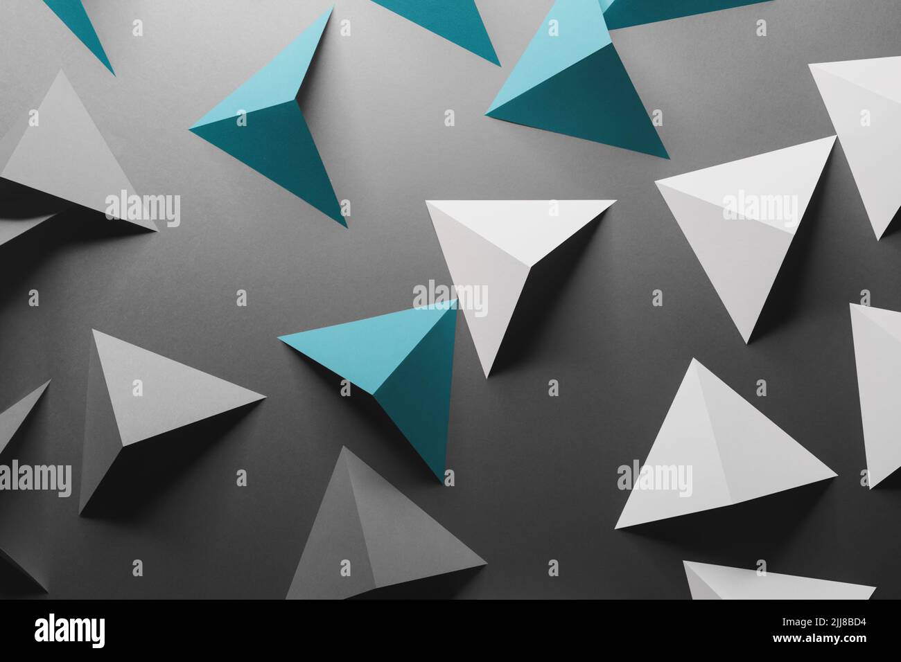 Triangular elements of paper, abstract Stock Photo - Alamy