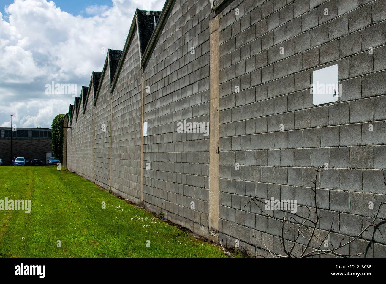 wall of an industrial building, facade of a warehouse Stock Photo - Alamy