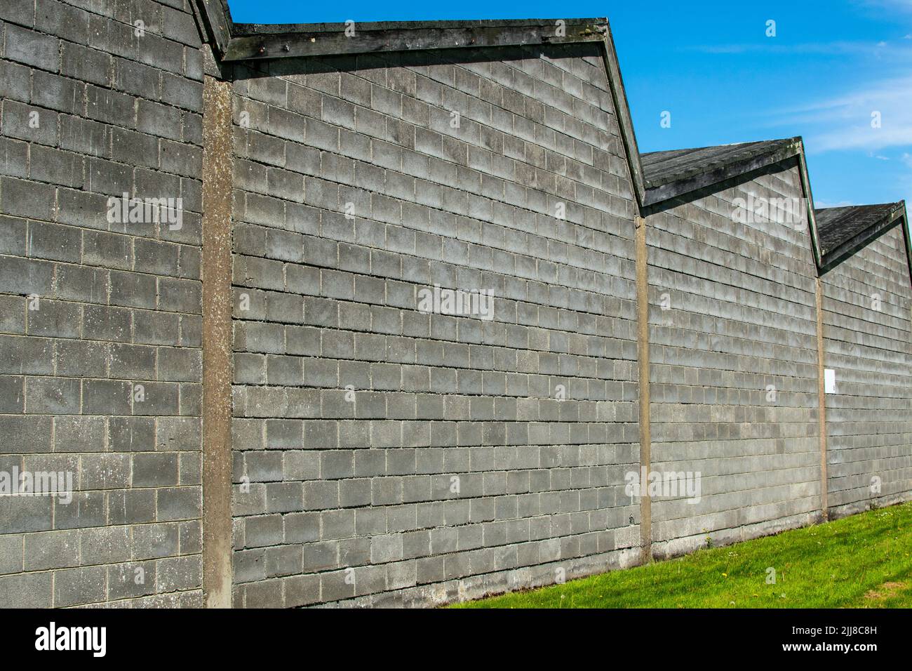 wall of an industrial building, facade of a warehouse Stock Photo - Alamy