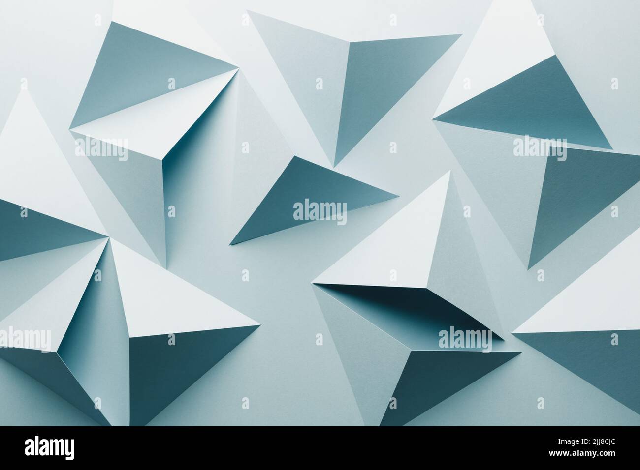 Triangular elements of paper, abstract Stock Photo - Alamy