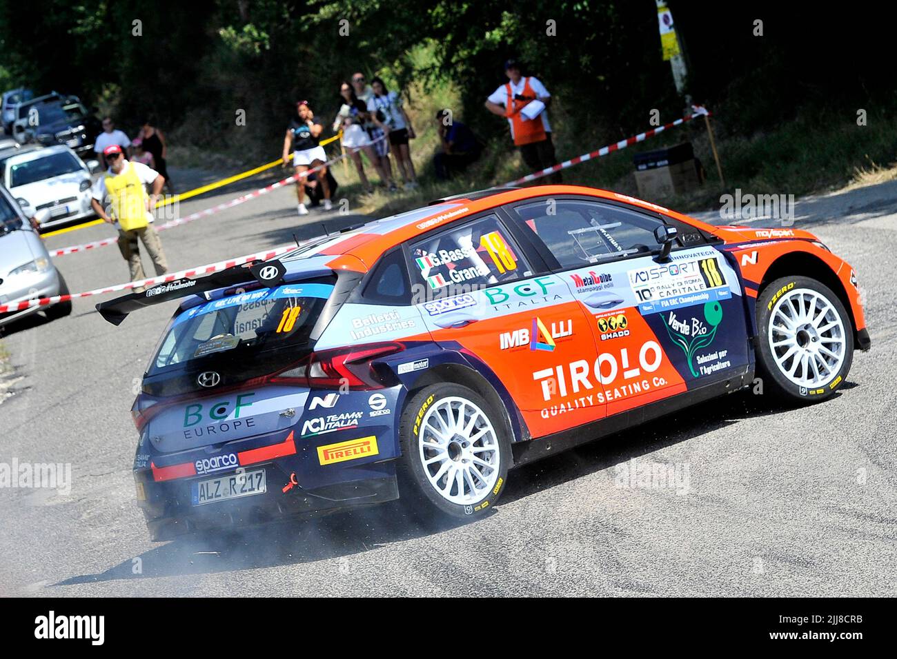 The driver Giandomenico Basso and his co-driver Lorenzo Granai aboard ...