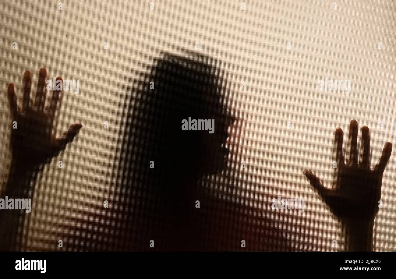 Horror ghost woman behind the matte glass. Halloween festival concept ...