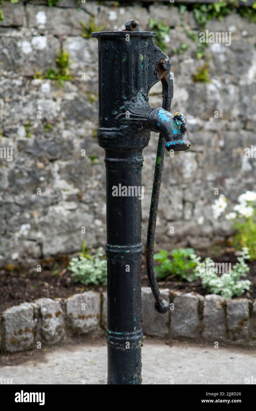 old antique water pump in historical village Stock Photo - Alamy