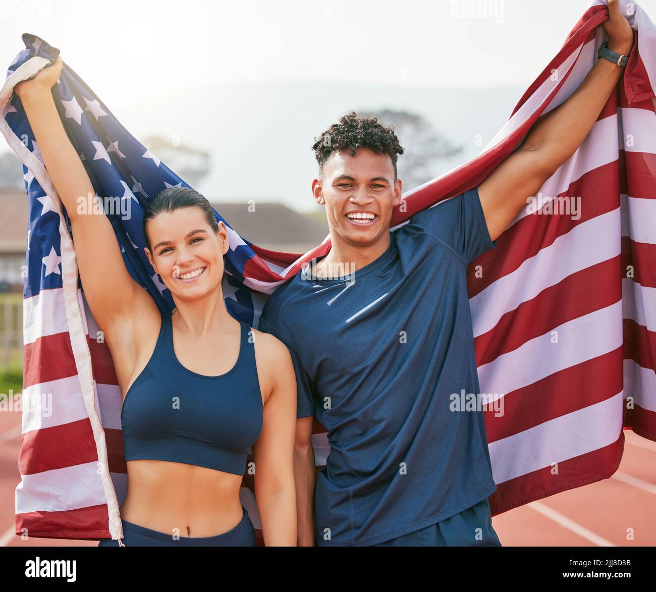 We win as one. Cropped portrait of two young athletes celebrating their ...