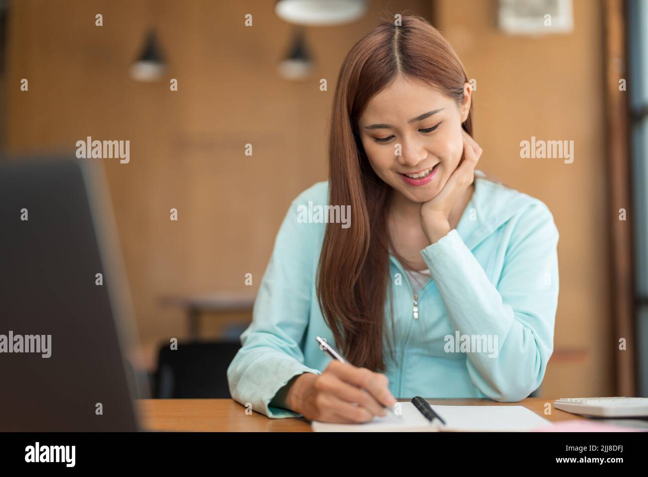 College education concept, Teenage girl watching video tutorial of ...