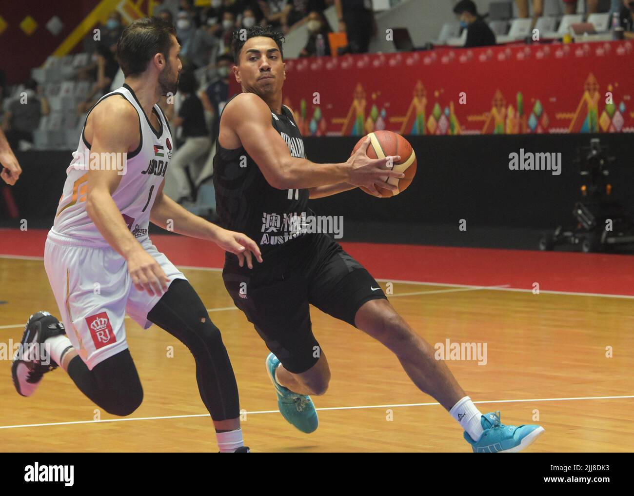 Jakarta, Indonesia. 24th July, 2022. Flynn Cameron (R) of New Zealand ...